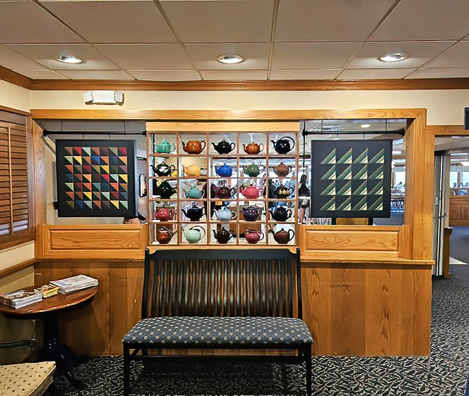 A teapot display that would make the Mad Hatter jealous &ndash; each colorful pot telling stories of countless conversations over steaming cups of comfort.