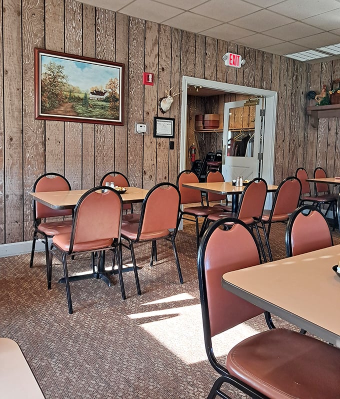 Wood-paneled walls and simple furnishings create the perfect no-nonsense backdrop for serious eating &ndash; this isn't d&eacute;cor, it's a donut delivery system.