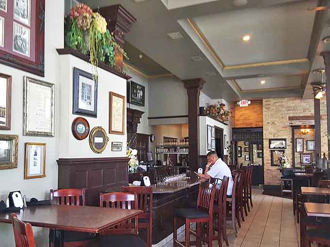 Rich wood accents, exposed brick, and warm lighting create an atmosphere that balances sophistication with comfort &ndash; the perfect backdrop for memorable meals.