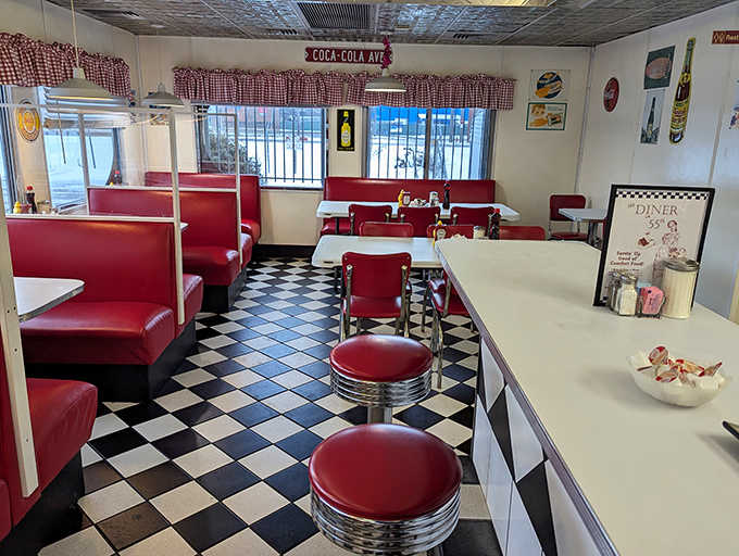 Red vinyl booths and checkerboard floors create the perfect backdrop for morning conversations and coffee refills.