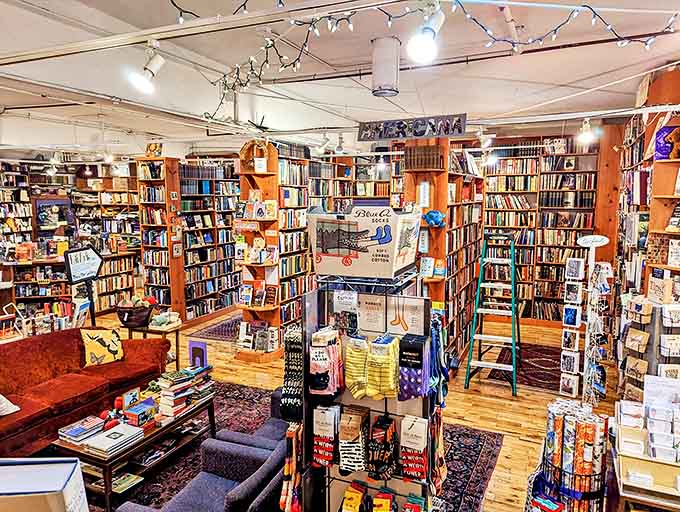 Floor-to-ceiling shelves create a labyrinth of literary treasures, where getting delightfully lost among the stacks is part of the experience.