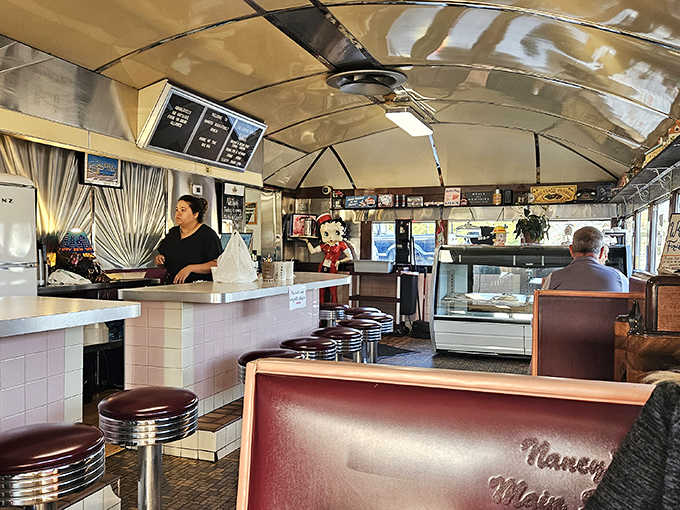 Inside, the curved ceiling and counter stools transport you to the 1950s &ndash; no DeLorean required, just an appetite for authentic diner charm.