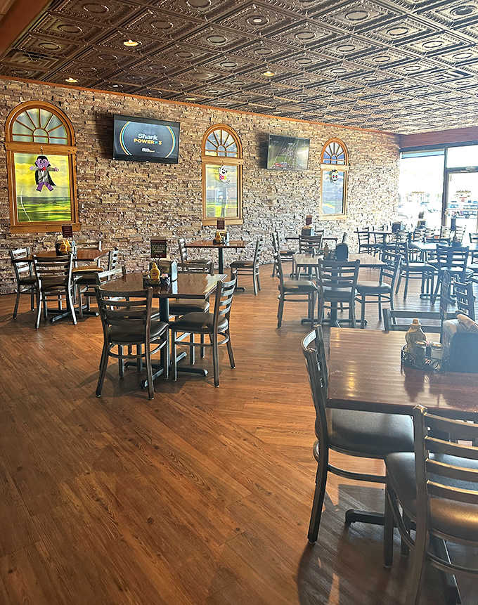 Exposed brick walls and ornate tin ceilings create the perfect backdrop for sandwich worship &ndash; rustic charm meets culinary excellence.