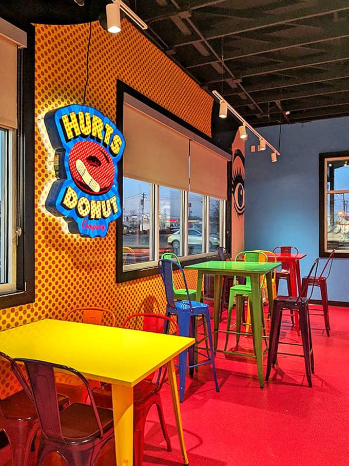 Stepping into a technicolor donut dreamscape where even the furniture celebrates sugar &ndash; those swings aren't just for kids!