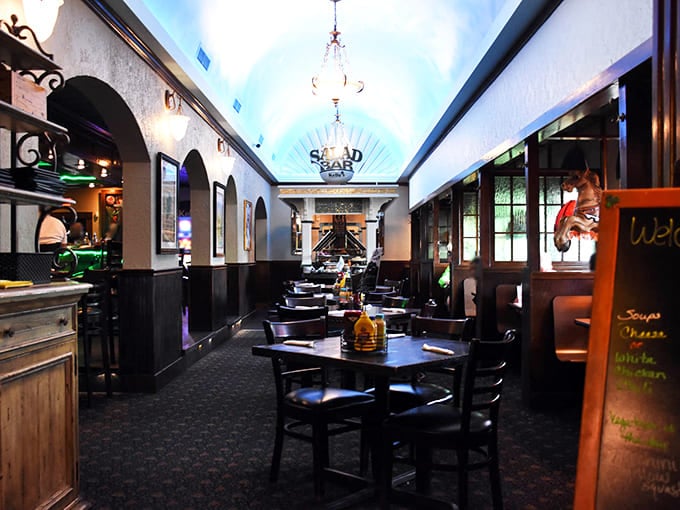 The dining room's elegant arched ceiling and warm lighting create an atmosphere that balances old-world charm with comfortable Midwestern hospitality.