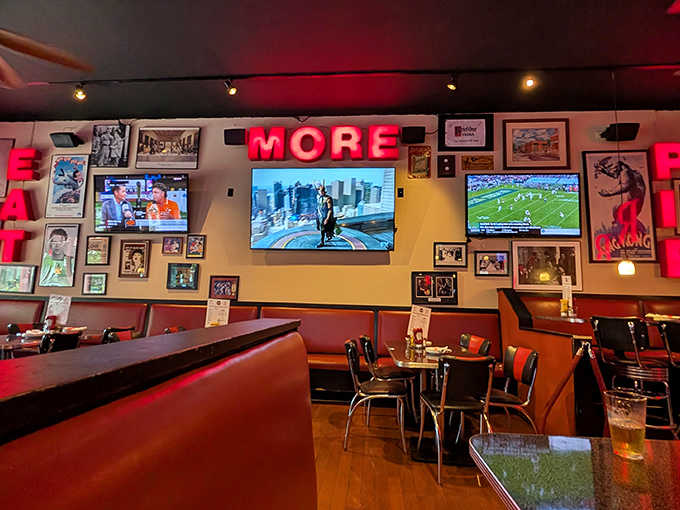Comic books meet sports bar vibes in this cozy space where the glowing "MORE" sign isn't just decoration&mdash;it's legitimate dining advice.