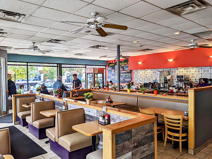 Interior: Cozy booths, warm lighting, and the constant buzz of conversation create that perfect diner atmosphere where calories don't count and diet plans surrender.