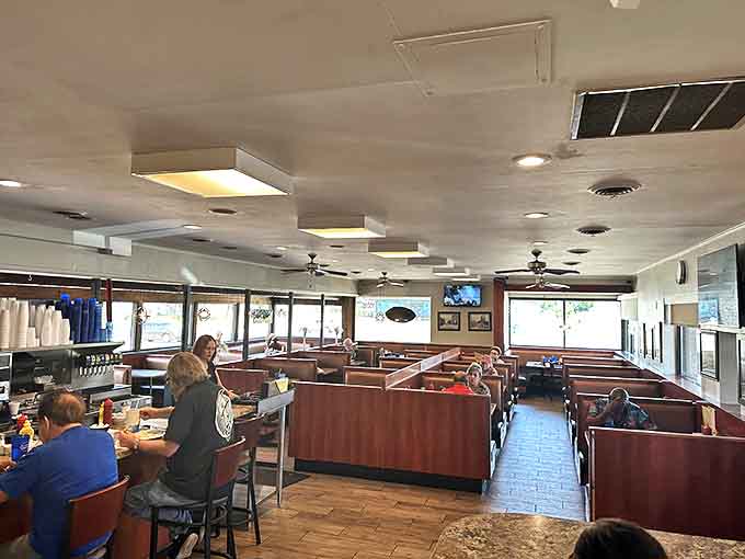 The interior welcomes with cozy booths and counter seating, where regulars gather for their daily dose of diner magic.