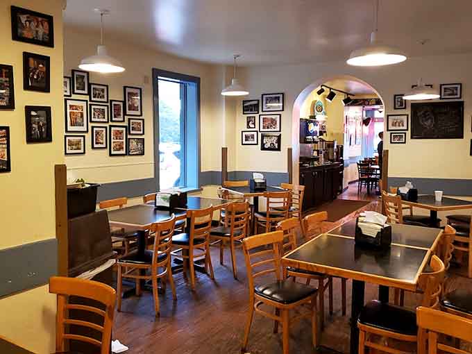 Inside, warm lighting and vintage photographs create the perfect backdrop for serious sandwich consumption and carrot cake contemplation.