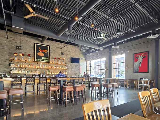 Exposed brick meets modern comfort in a space that feels like an urban loft decided to vacation in Minnesota.