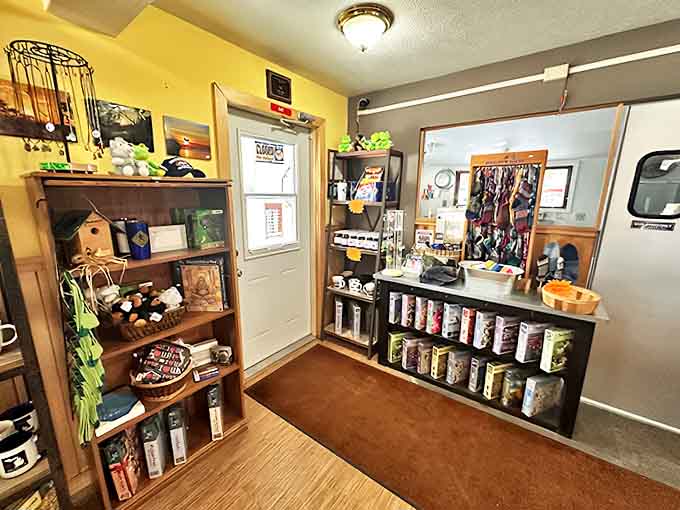 Inside Muldoons: Shelves stocked with local treasures and treats, creating a cozy shopping experience between bites of flaky pasty goodness.