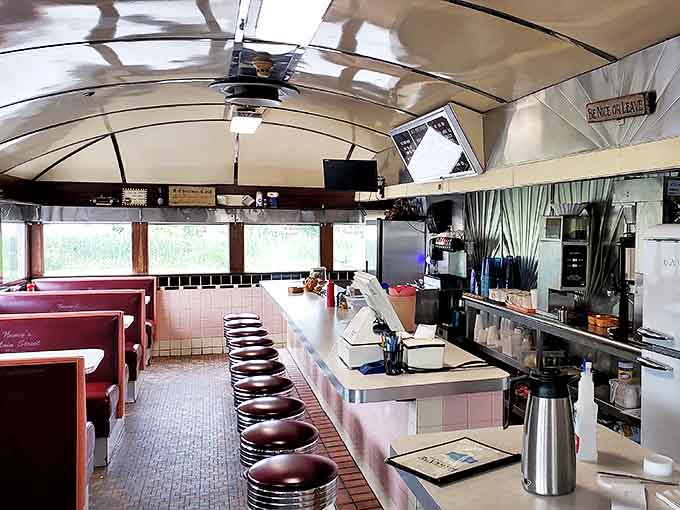 Classic counter seating with those perfect spin-just-right stools invites solo diners to perch while watching the kitchen ballet unfold.
