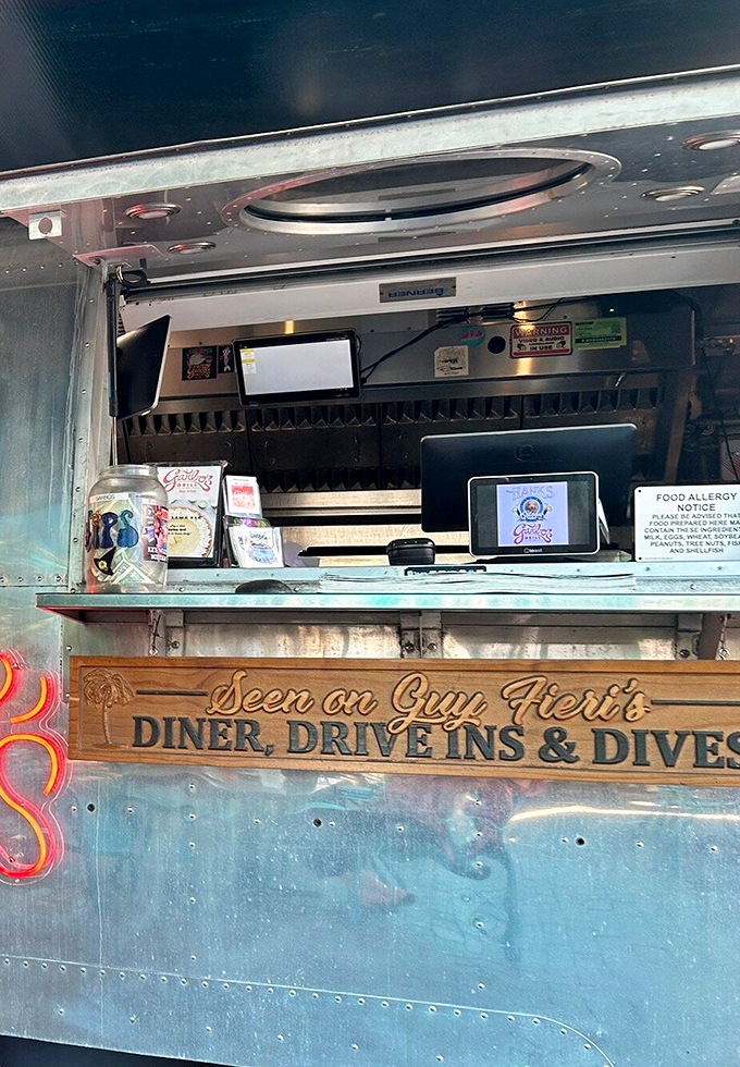 Order window: Where food dreams come true! The compact command center where friendly faces take orders and work magic in an impossibly efficient space.