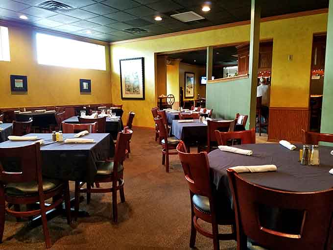 Warm lighting and comfortable seating create the perfect atmosphere for a meal that deserves your full attention and appreciation.