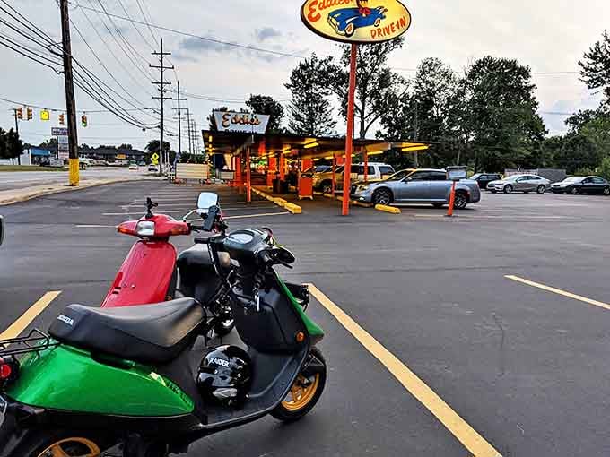 Classic chrome meets modern machines in Eddie's lot, where automotive history and hunger satisfaction create the perfect American pairing.