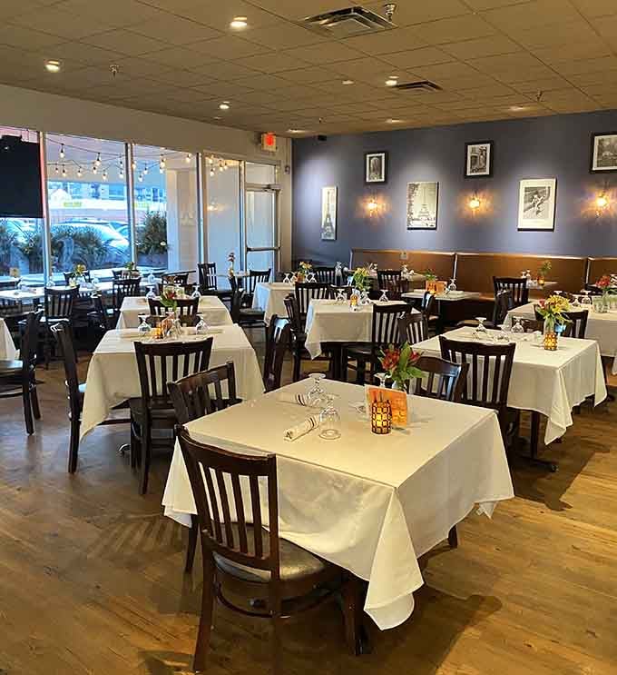Crisp white tablecloths and warm lighting create an atmosphere that's fancy enough to feel special, casual enough to relax.
