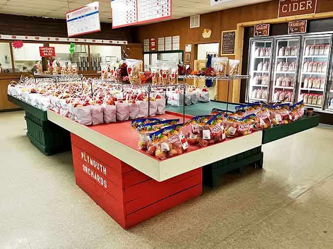 Inside the farm store, temptation takes physical form &ndash; bags of fresh-picked apples and local treats arranged like an edible art installation.