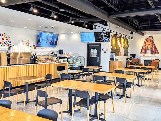 Modern meets traditional in this airy, light-filled space where wooden accents and sleek design create the perfect backdrop for coffee exploration.