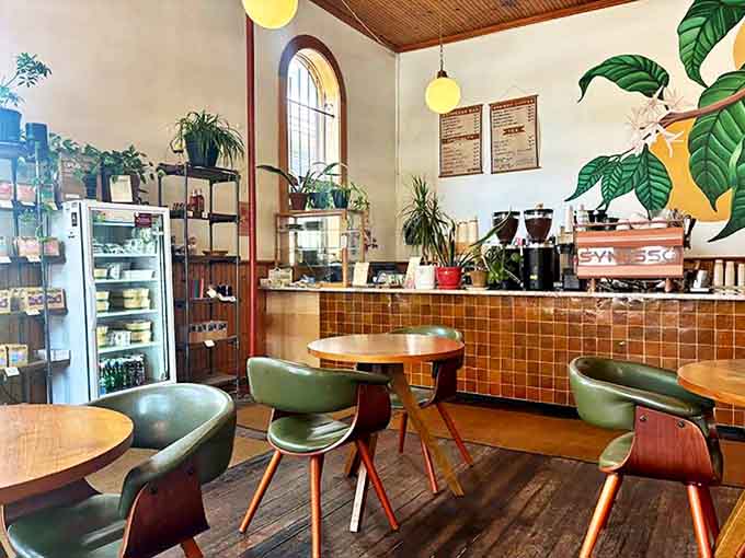 Interior Warm wooden ceilings meet abundant natural light in this former industrial space turned coffee sanctuary. The perfect balance of cozy and cool.