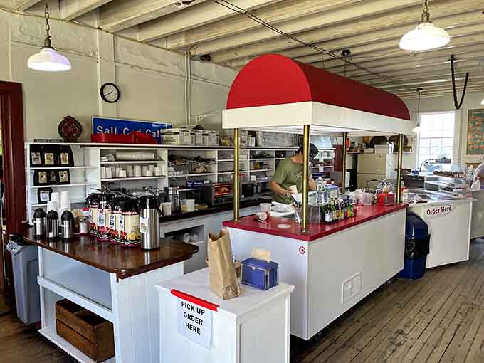 Inside, the cheerful red and white counter setup feels like stepping into a coastal dream where calories definitely don't count.