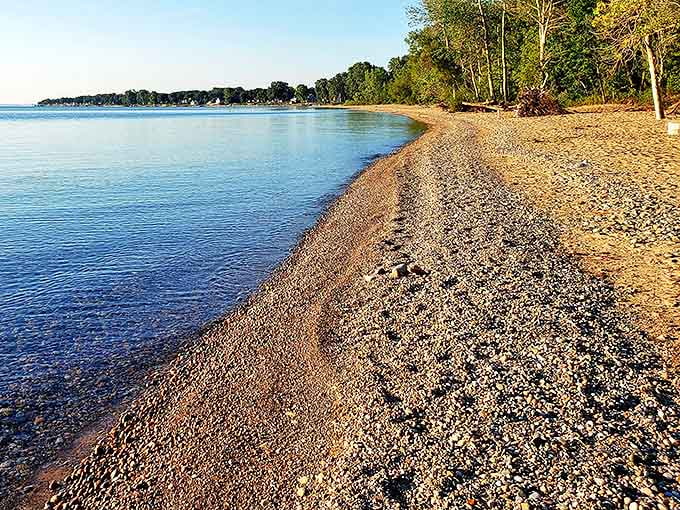 The gentle curve of Lakeport's shoreline creates a perfect meeting place where pebbles, sand, and crystal-clear Lake Huron waters converge.