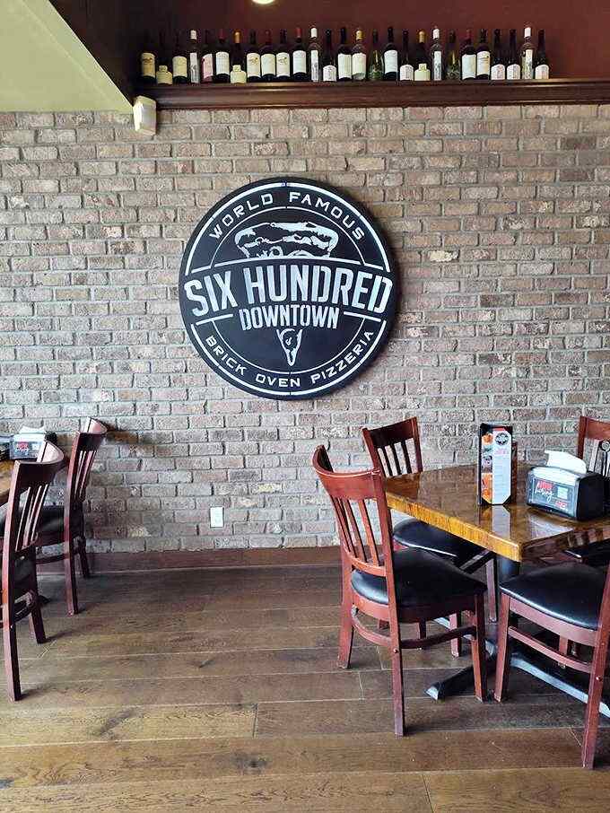 Exposed brick walls and a cozy atmosphere set the stage for pizza magic &ndash; this isn't just dining, it's a full sensory experience.