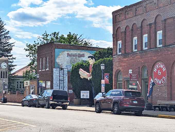 Main Street Atlanta offers that perfect small-town backdrop, where brick buildings frame the giant's silhouette against the Midwestern sky.