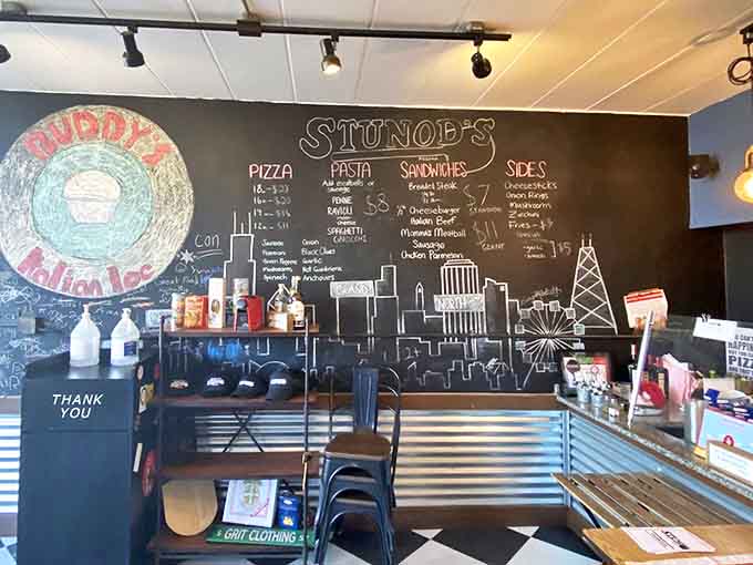 The chalkboard menu wall doubles as Chicago art gallery, showcasing the skyline alongside daily specials that never disappoint.