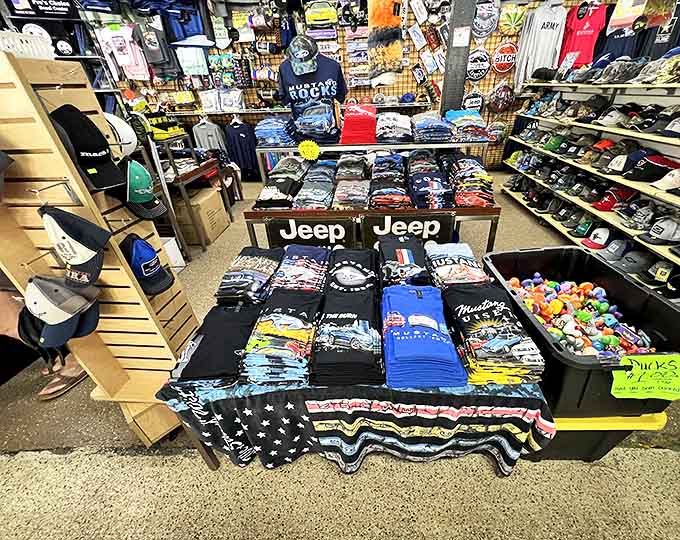 T-shirt heaven where your college alma mater sits next to vintage rock bands and obscure references only true fans would recognize.