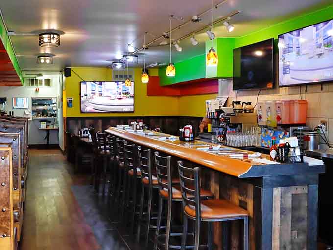 Bold stripes and warm wood create a space that's as inviting as your favorite friend's kitchen, but with better food.