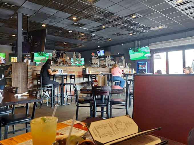 Inside, rustic charm meets sports bar energy, creating the perfect backdrop for memorable meals and even better conversations with fellow diners.