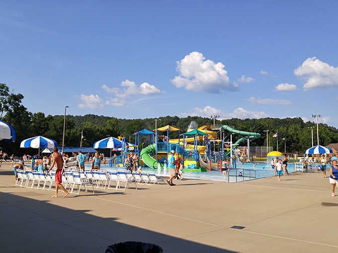 A panoramic view of summer bliss &ndash; azure waters stretch across the park while colorful slides promise adventures for the brave.