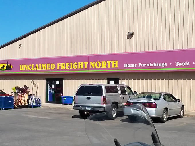 That vibrant purple and yellow signage isn't just eye-catching &ndash; it's practically a beacon for bargain hunters with a nose for northwoods treasures.