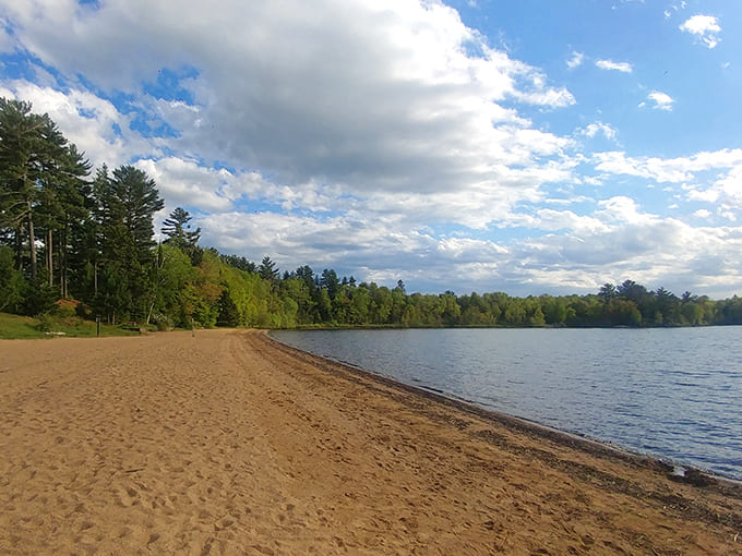 Lake Michigamme's sandy shores offer a peaceful retreat where your footprints might be the only ones marking the pristine beach.