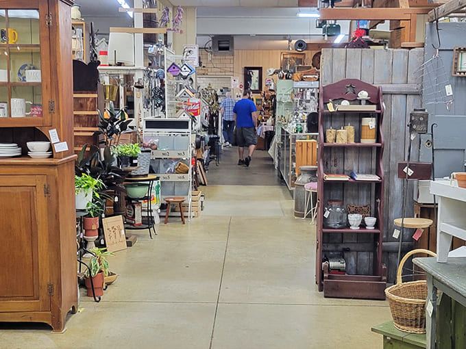 Endless aisles of organized chaos await inside, proving that heaven might actually be a well-stocked antique mall with good lighting.