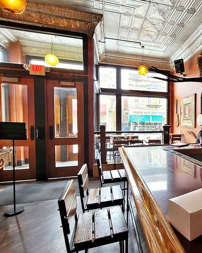 Inside Watson's, vintage pressed tin ceilings and warm lighting create the perfect backdrop for chicken-induced happiness and friendly conversation.