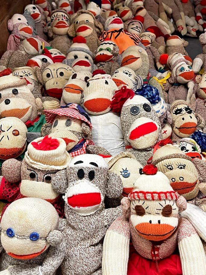 A sea of sock monkey faces greets visitors &ndash; each one with its own personality and slightly different expression.