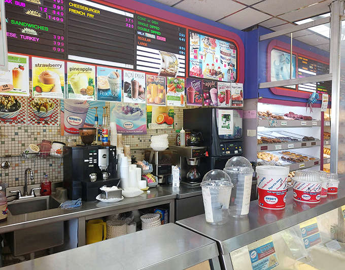 Behind this counter, donut magic happens daily. The no-frills setup focuses on what matters most—creating Detroit's most beloved donuts.
