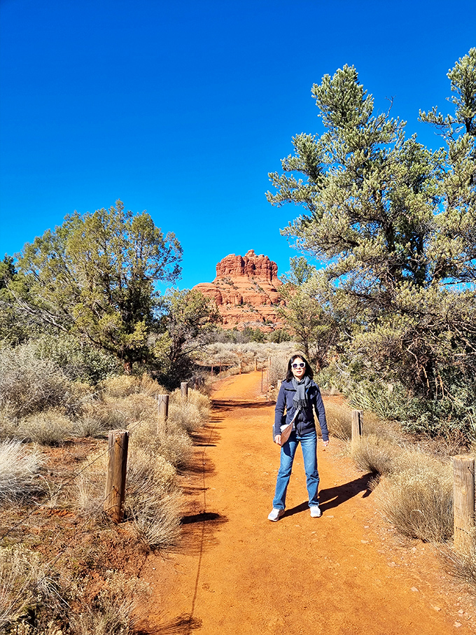 The ochre trail beckons adventurers toward Bell Rock, promising views worth every step of the dusty journey ahead.