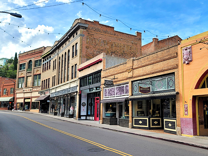 Downtown Bisbee's historic buildings whisper tales of copper fortunes and wild west adventures, their brick facades housing modern treasures behind century-old doors.