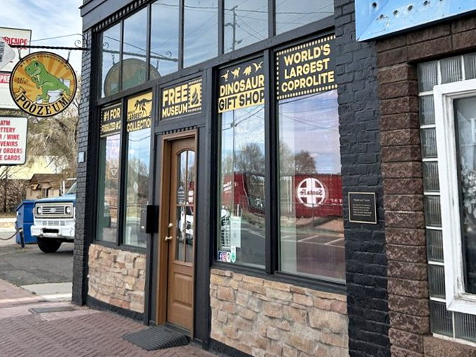 Bold window signs proudly announce "World's Largest Coprolite" and "Free Museum," proving some of life's most educational experiences come without a price tag.