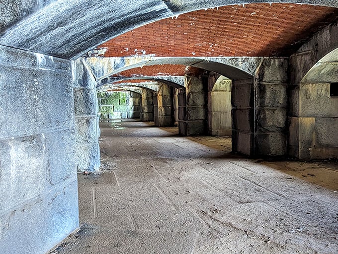 Stone corridors echo with history, their brick-vaulted ceilings a testament to 19th-century military engineering and craftsmanship.