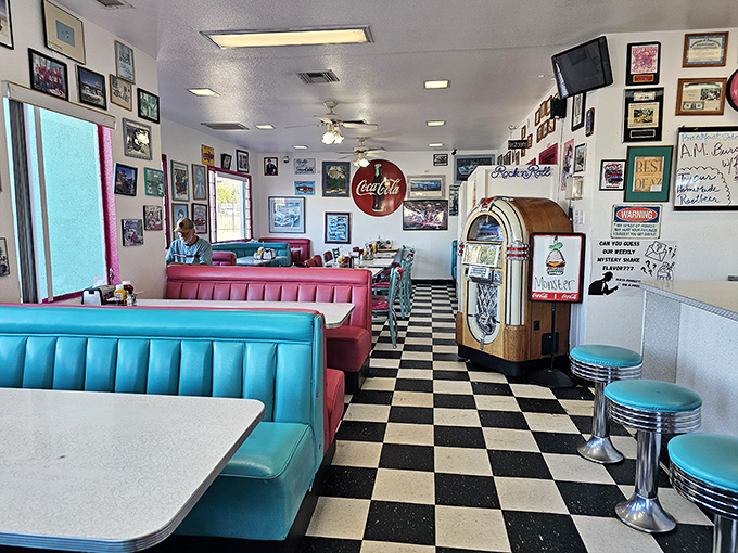 Black and white checkered floors play tag with turquoise booths and cherry-red accents in this time capsule where calories don't count.