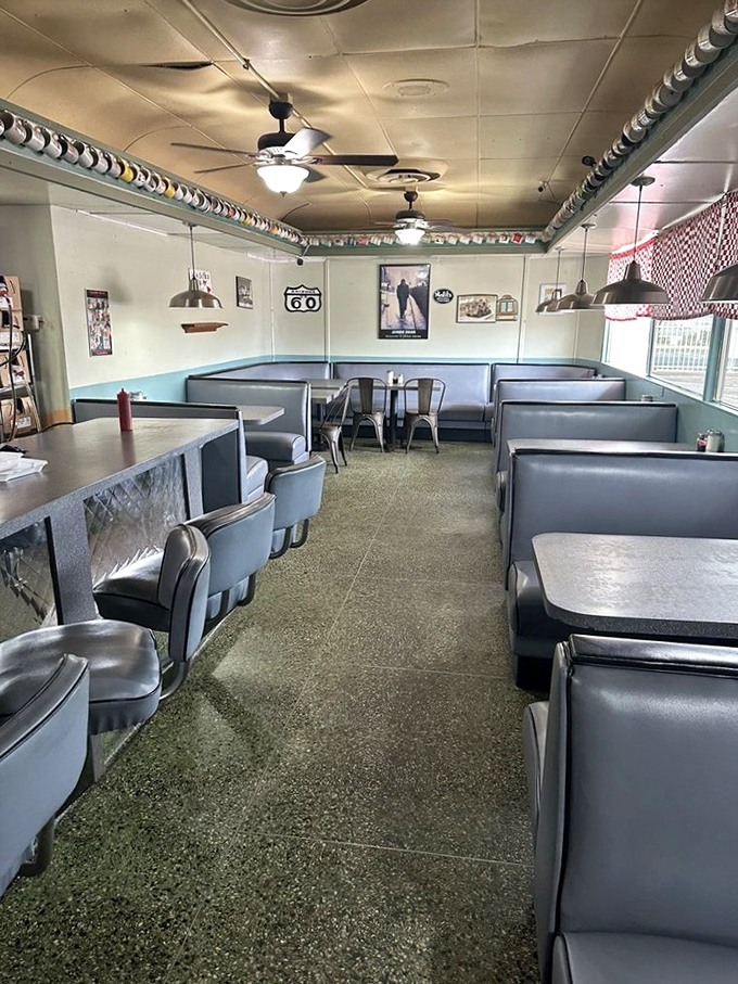 Classic blue vinyl booths and vintage decor transport diners to a simpler era, where conversations flow as freely as the coffee.