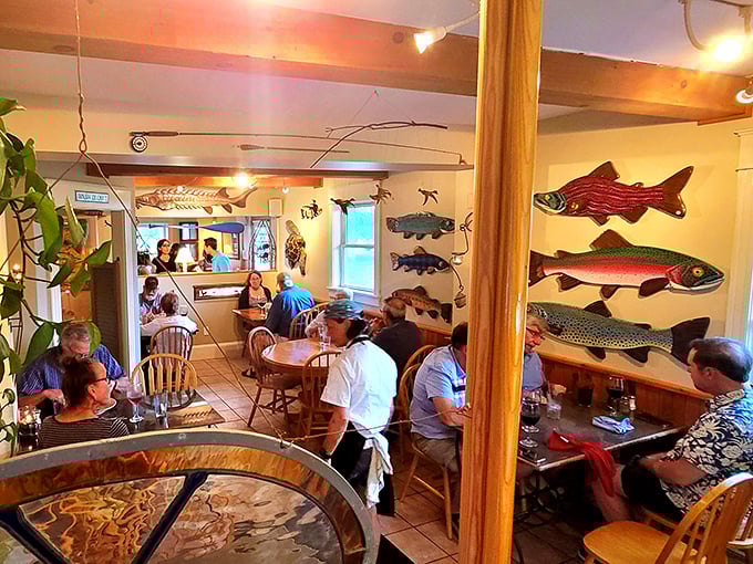 Inside, colorful fish art swims across walls while diners enjoy intimate tables in a space that feels like Vermont's best-kept secret.