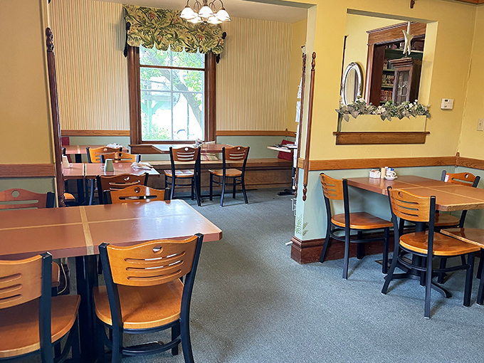 Warm wood paneling and cozy tables create an atmosphere that feels like dining in your favorite aunt's country kitchen.