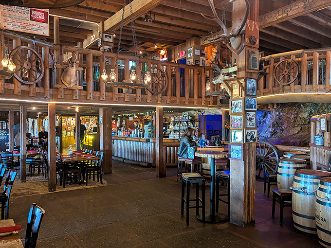 Step inside and you're transported to the Old West – wagon wheels, wooden beams, and enough cowboy charm to make John Wayne feel right at home.