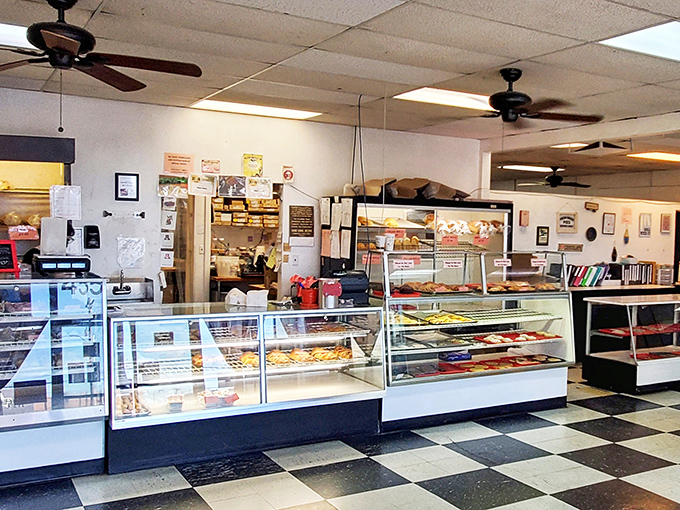 Step inside to a world where black and white checkered floors meet display cases filled with temptation &ndash; simplicity that lets the baked goods shine.