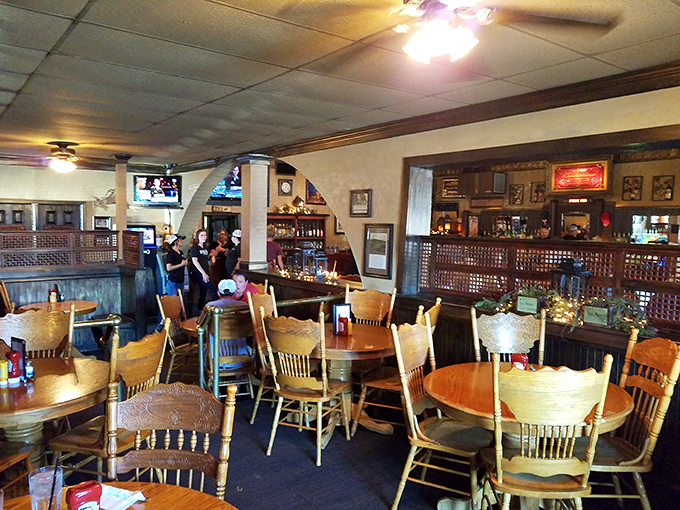 Wooden tables and chairs create that perfect "everybody knows your name" atmosphere, where conversations flow as freely as the drinks.