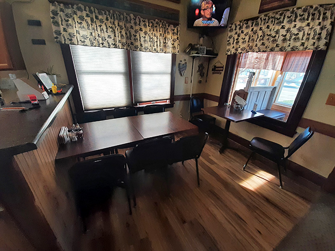 Cozy corners and simple charm: The dining area feels like eating in a friend's home, if your friend made legendary pizza.